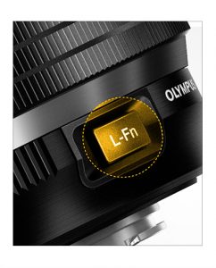 What does the L-Fn button do on a Olympus camera? - 43addict